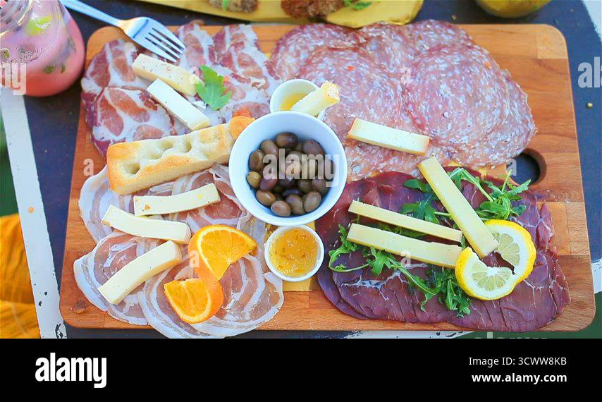 Tasty italian food. Fresh bruschettes, cheeses and meat on the board in ...