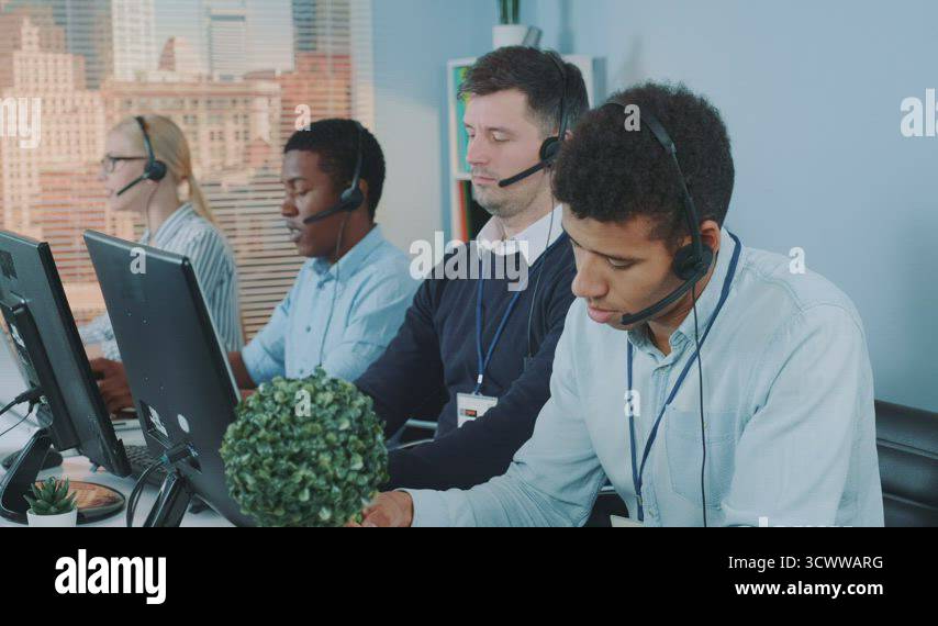 Medium shot of Frustrated and angry mixed-race call center agent ...