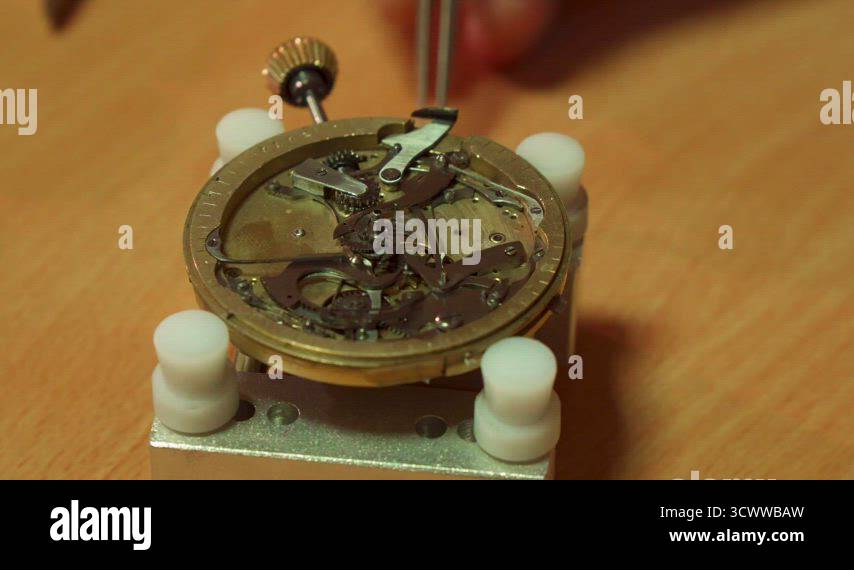 Watchmaker puts cogwheel into the repeater mechanism Stock Video ...