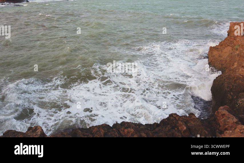 Ocean wave crashing rocks Stock Videos & Footage - HD and 4K Video ...