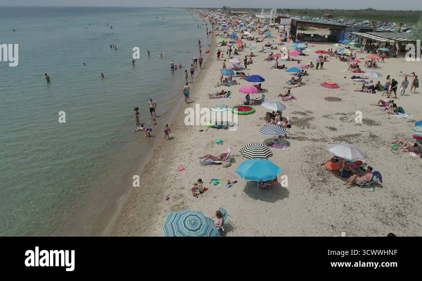Swimmers enjoying the sea on Potamos beach in Epanomi of Thessaloniki ...