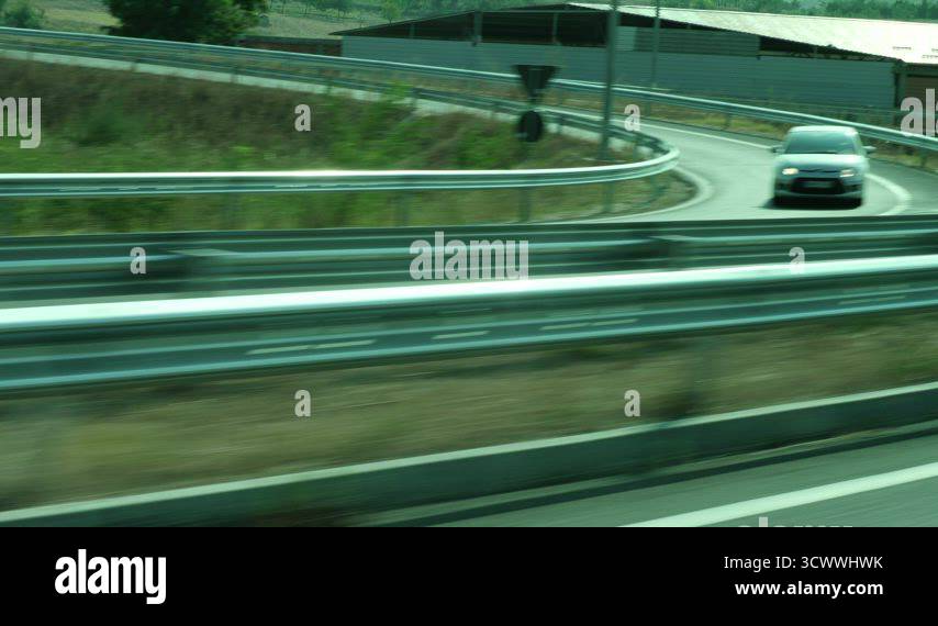 Day Road Journey Through Rural Area.View Of Nature On The Left Side Car ...