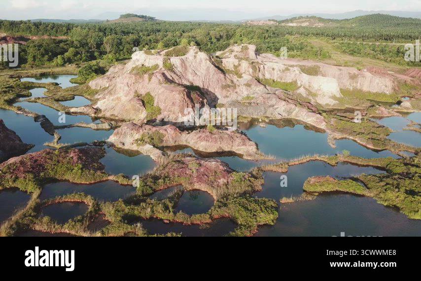 Aerial view quarry with blue water Stock Video Footage - Alamy