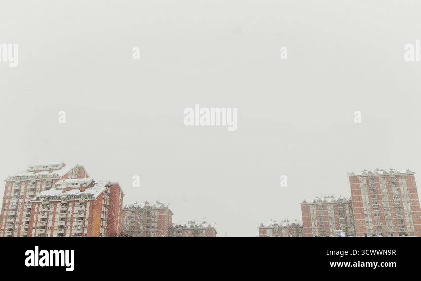 Snow falling buildings in background Stock Videos & Footage - HD and 4K ...