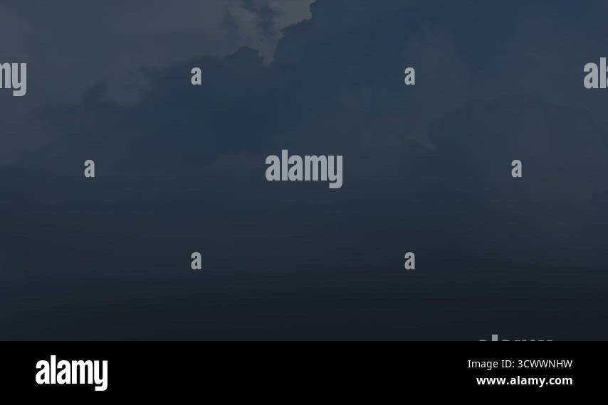 Time lapse motion the Black rain clouds are moving fast on the sky in ...