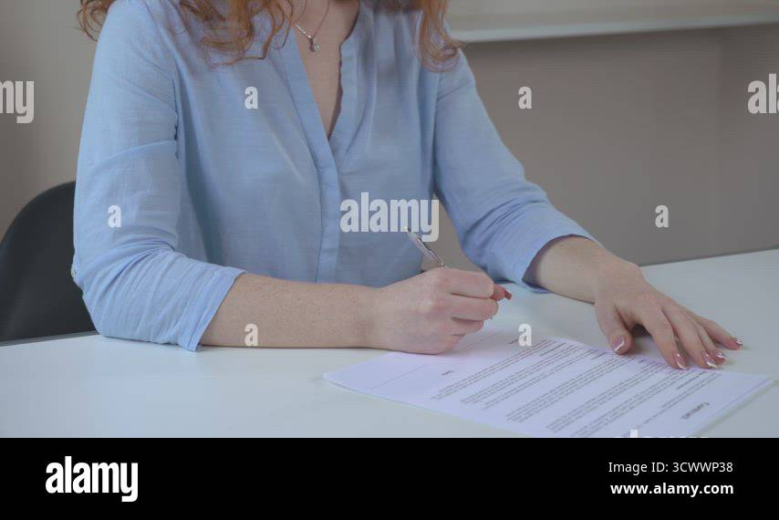 Close up female writing signature Stock Video Footage - Alamy