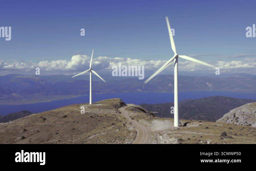windmills in wind power farm generating sustainable energy Stock Video ...