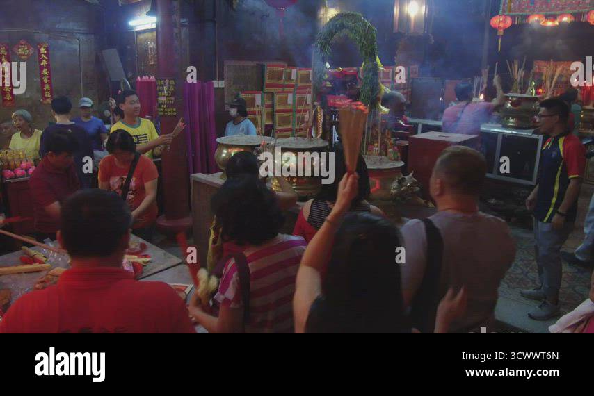 Worshiper inside Thai Pak Koong Temple Tanjung Tokong Stock Video ...
