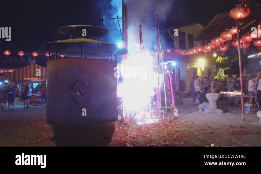 Fire crackers burn at Thai Pak Koong Temple Tanjung Tokong Stock Video ...