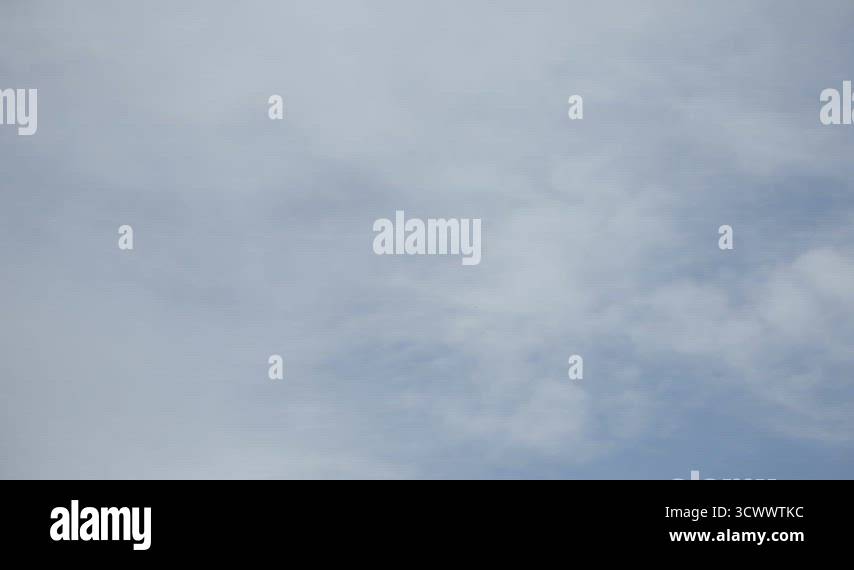 Time lapse motion the clouds are moving fast on the sky in the daytime ...