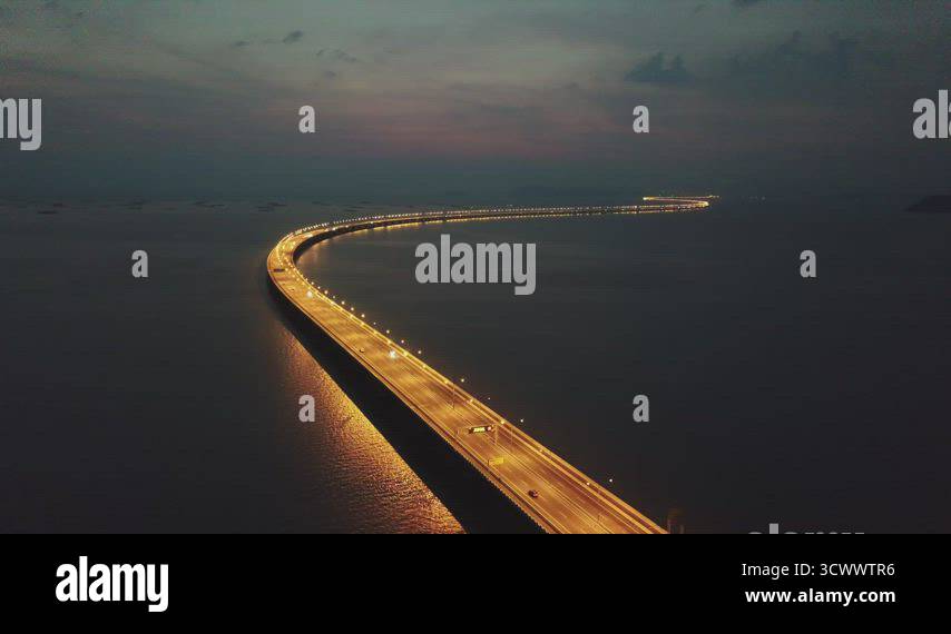 Aerial fly outward from Penang Second Bridge at night Stock Video ...