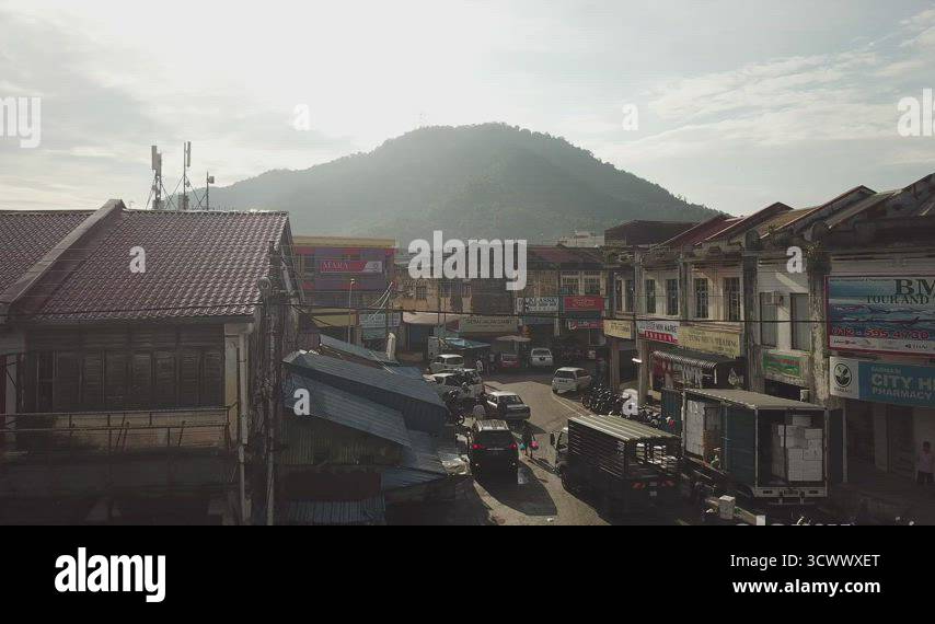 Aerial busy small town in morning. Cherok Tokun Hill at back Stock ...