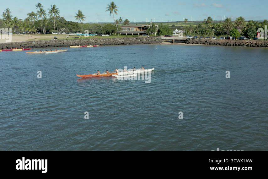 Hawaiian canoes in race on river Anahulu in Haleiwa on Oahu Stock Video ...