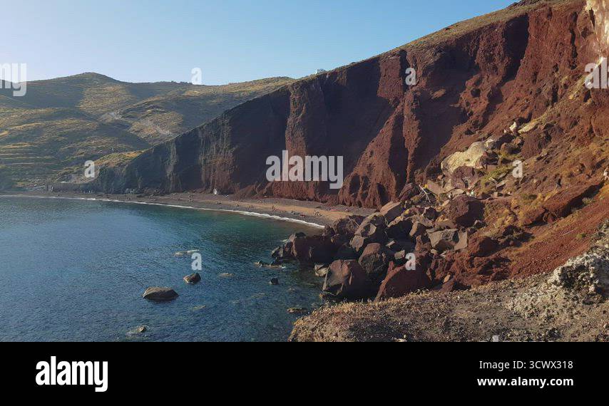 Famous Red Beach, with volcanic sand and rocky shoreline on Santorini ...