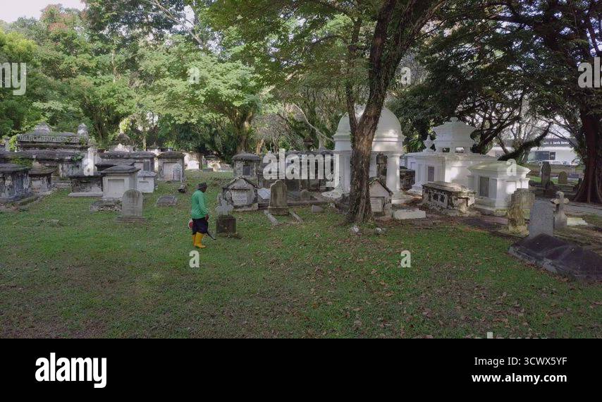 Gimbal shot workers clean at Western Cemetery (Northam Road Cemetery ...