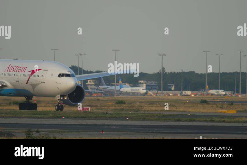 Boeing 777 taxiing before departure Stock Video Footage - Alamy