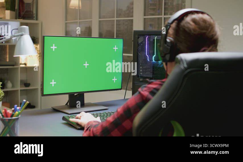 Over shoulder shot of pro female gamer playing on computer Stock Video ...