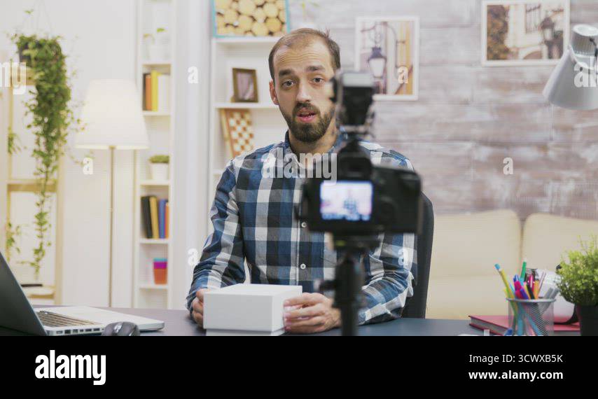 Famous vlogger filming unboxing Stock Videos & Footage - HD and 4K ...
