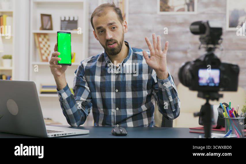 Young and famous influencer filming a review Stock Video Footage - Alamy