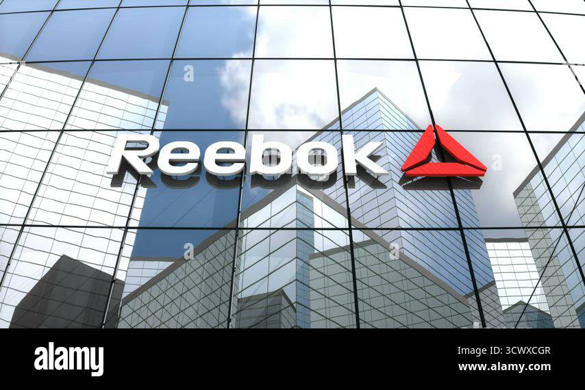 Editorial, Reebok International logo on glass building Stock Video ...