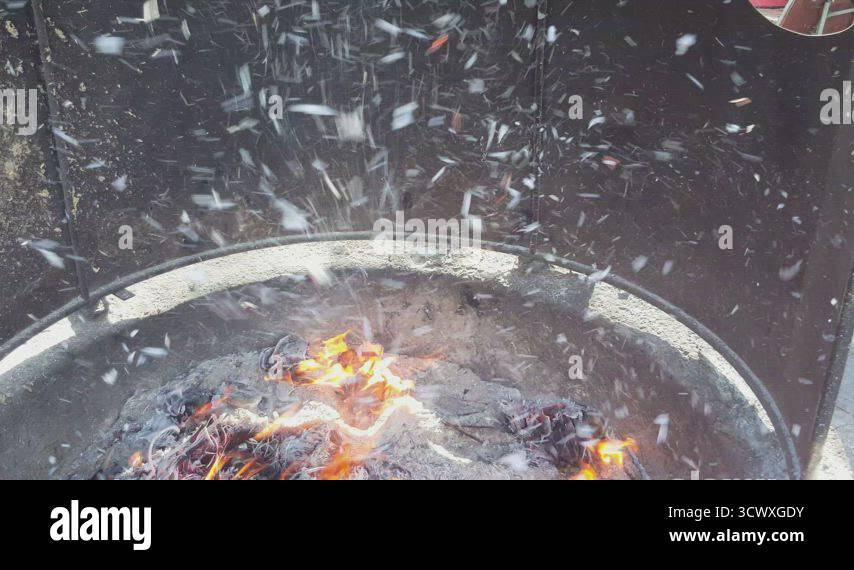 Spread of burning ashes of joss paper Stock Video Footage - Alamy
