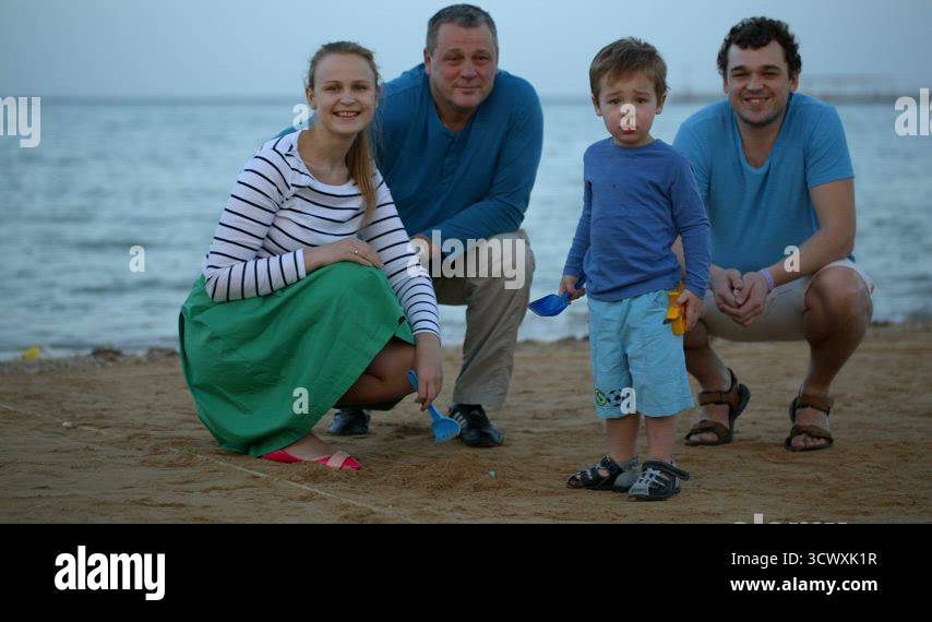 Happy family at the seaside Stock Video Footage - Alamy