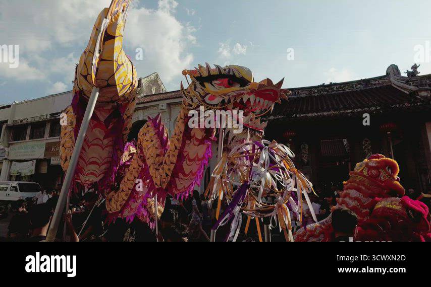 Dragon dance chase the pearl during chinese new year celebration Stock ...
