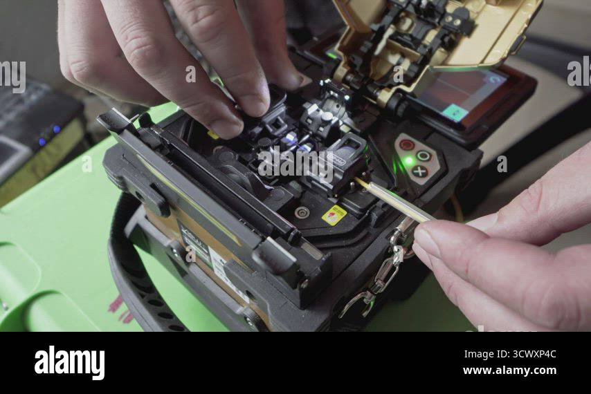 fiber optic cable splice machine closeup Stock Video Footage - Alamy