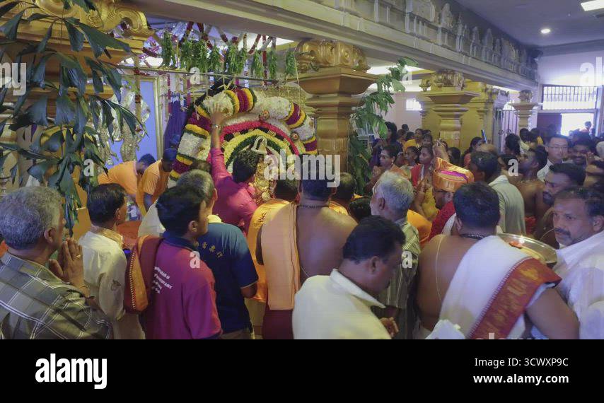Staff carry altar in the temple for procession Stock Video Footage - Alamy