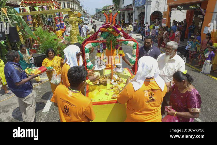 Coconut cut by the staff before offering to the deity Stock Video ...