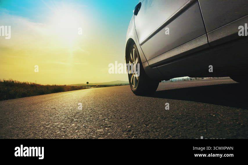 Luxury sport car on highway, road. Very fast driving. Wonderfull sunset ...