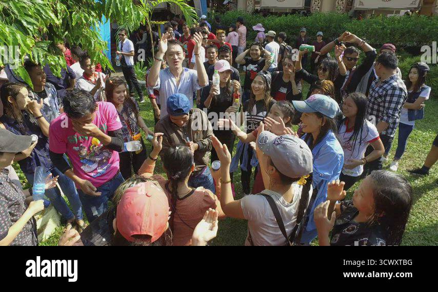High angle Burmese people dance happily to celebrate Songkran festival ...