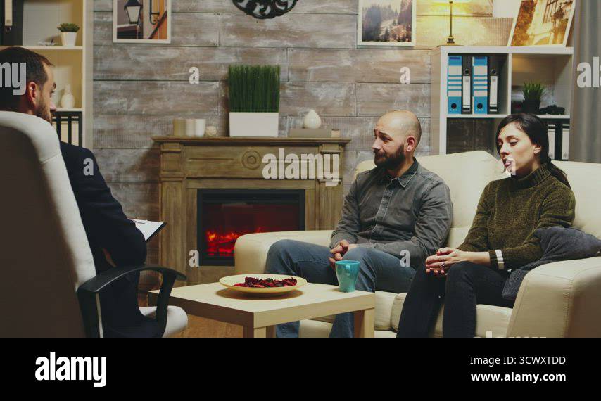 Sad boyfriend sitting on couch at couple therapy Stock Video Footage ...