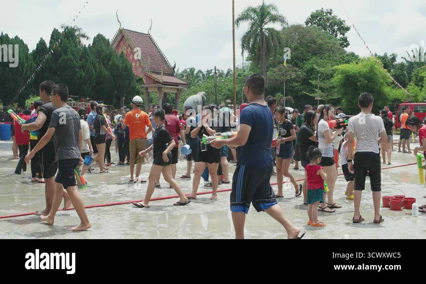 Children have fun water splash during Songkran festival Stock Video ...