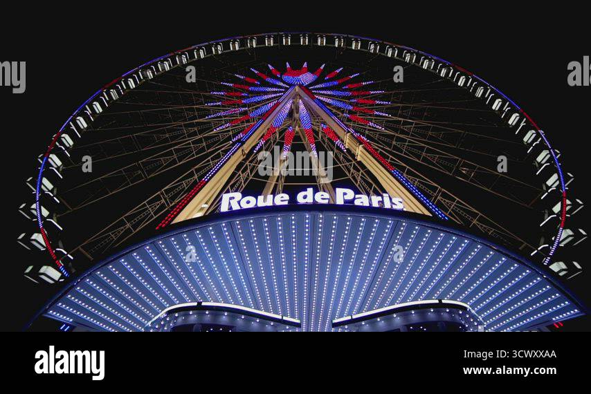 Paris, France - circa May, 2017: Night view of the giant Ferris Wheel ...