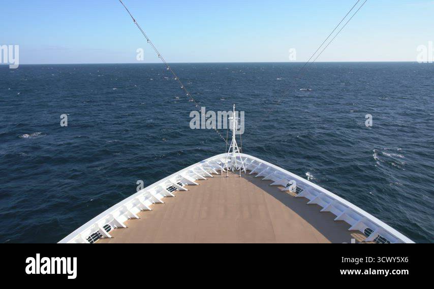 View from front of cruise ship into the waves and the destination Stock ...