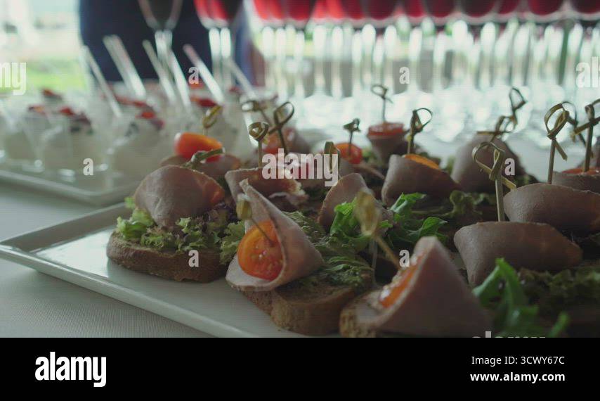 Canape food at white plate Stock Video Footage - Alamy