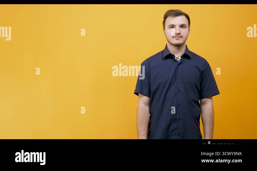 Happy young man dancing in studio Stock Video Footage - Alamy