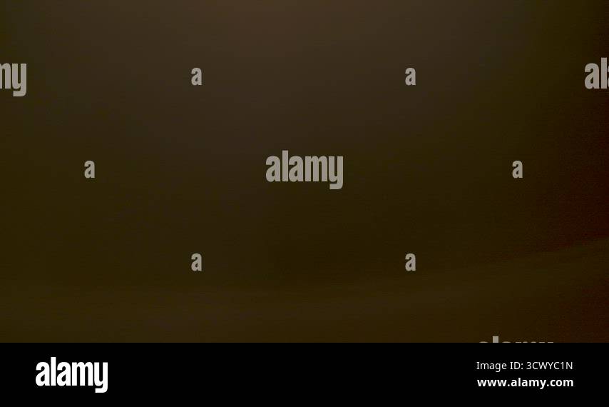 Bright light flares on a dark background Stock Video Footage - Alamy