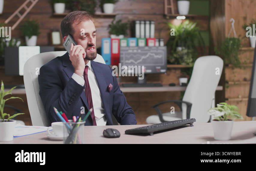 Slow motion footage of angry and stressed businessman screaming in the ...