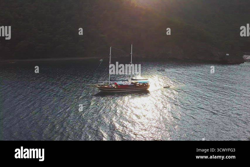 Gulet type sailing yacht underway on sunset in the Ekincik Bay. Gulet ...
