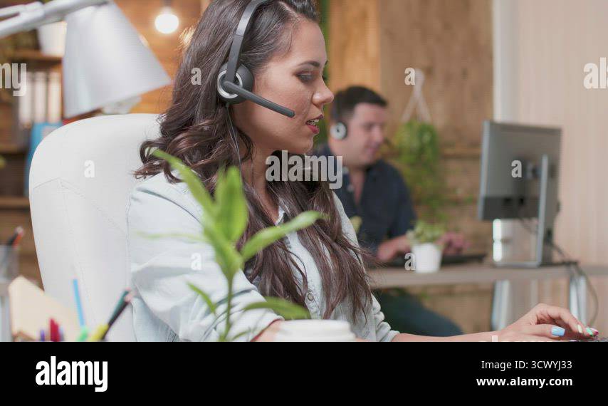 Close up portrait of female sales representative talking with a client ...