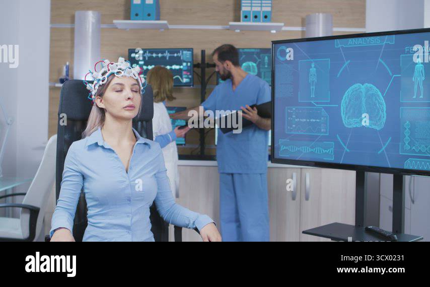 Female patient falling asleep while wearing brain activity scanner ...