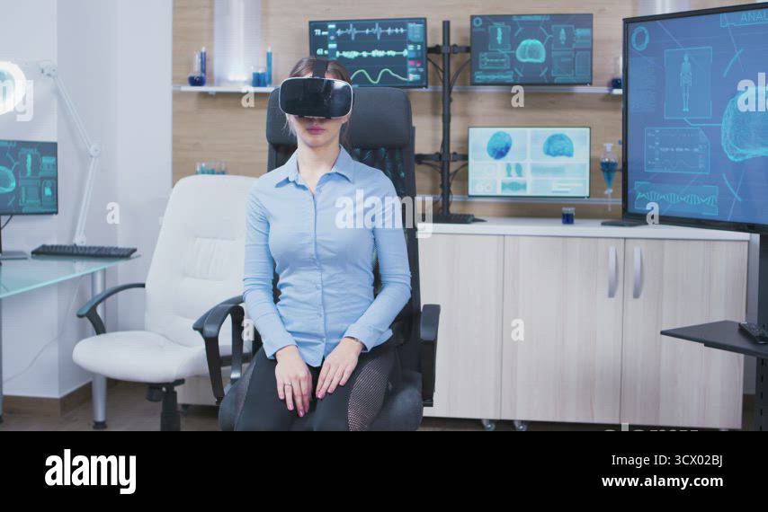 Young female using virtual reality goggles in a neurology lab science ...