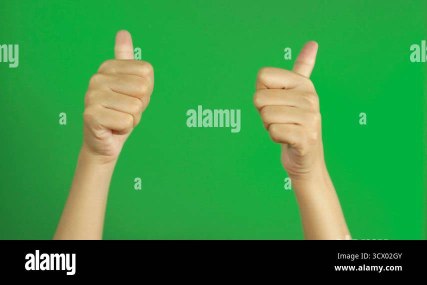 4K. woman hands showing two thumbs up and pointing on copy space ...