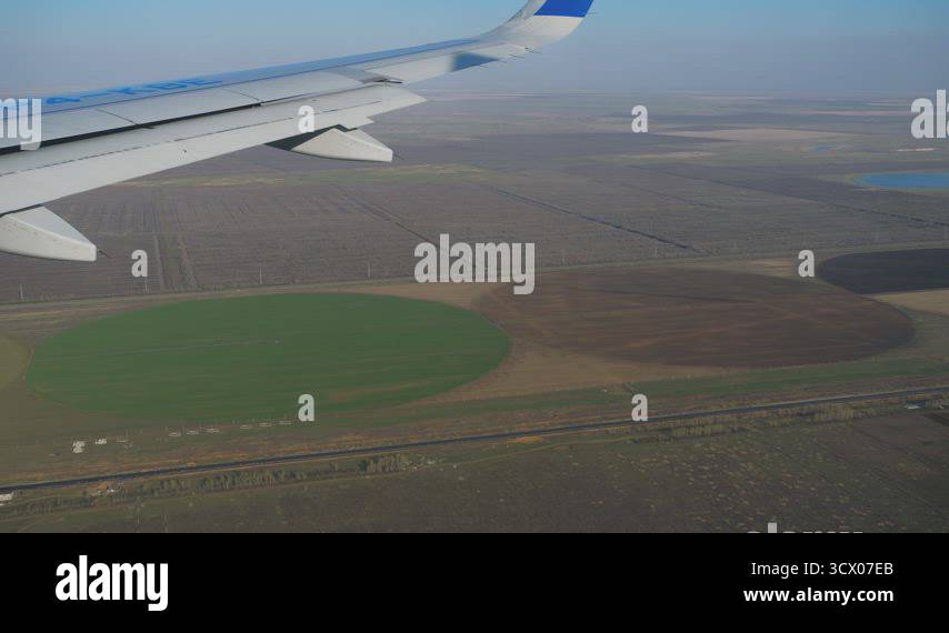 Aerial view from descending airplane Stock Video Footage - Alamy