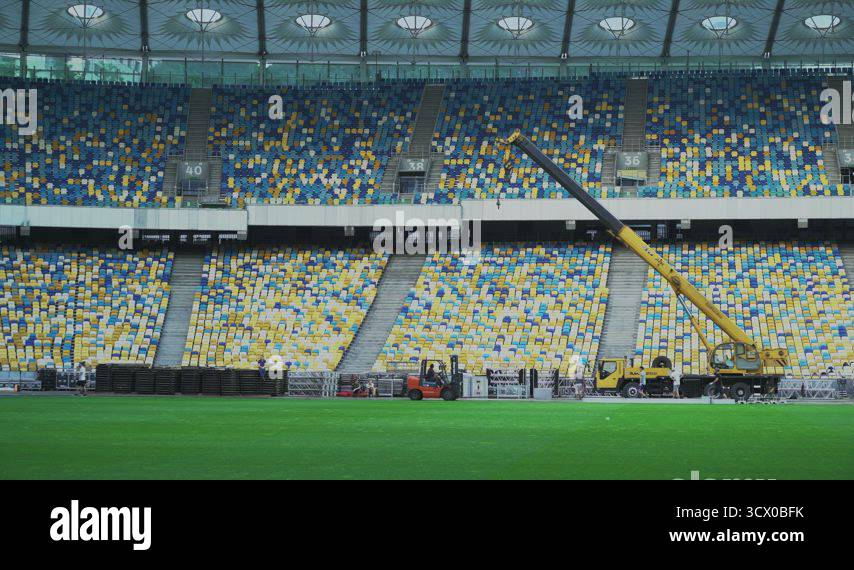 Construction work on the big stadium with the projector and the screen ...