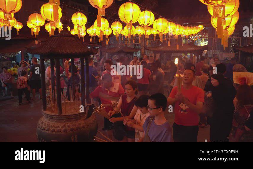 Chinese devotees burn incense stick Stock Videos & Footage - HD and 4K ...