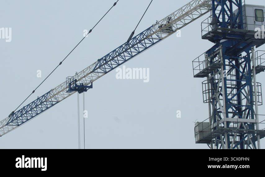 Tower crane at work Stock Video Footage - Alamy