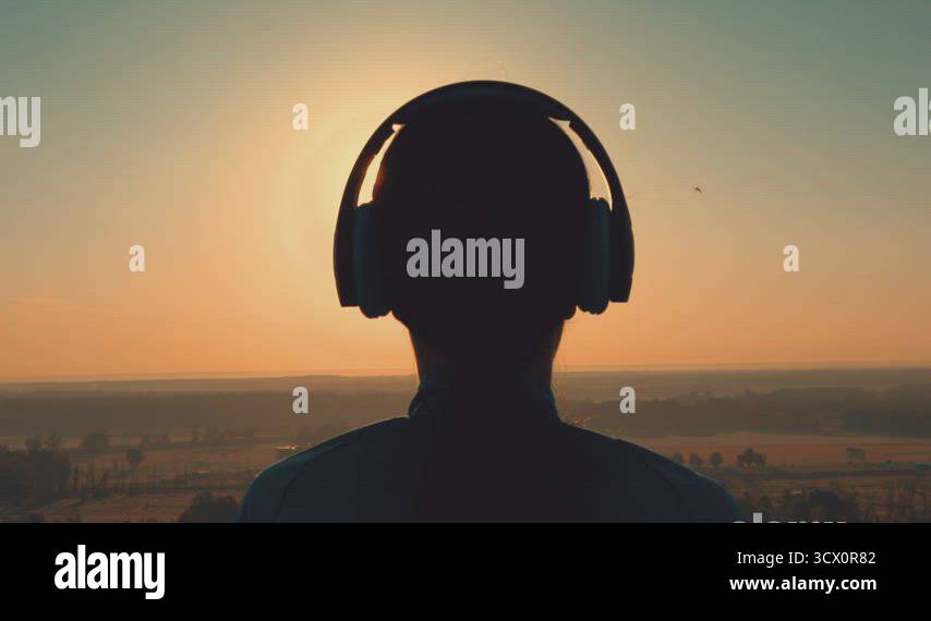 close up back view of woman head headphones Stock Video Footage - Alamy